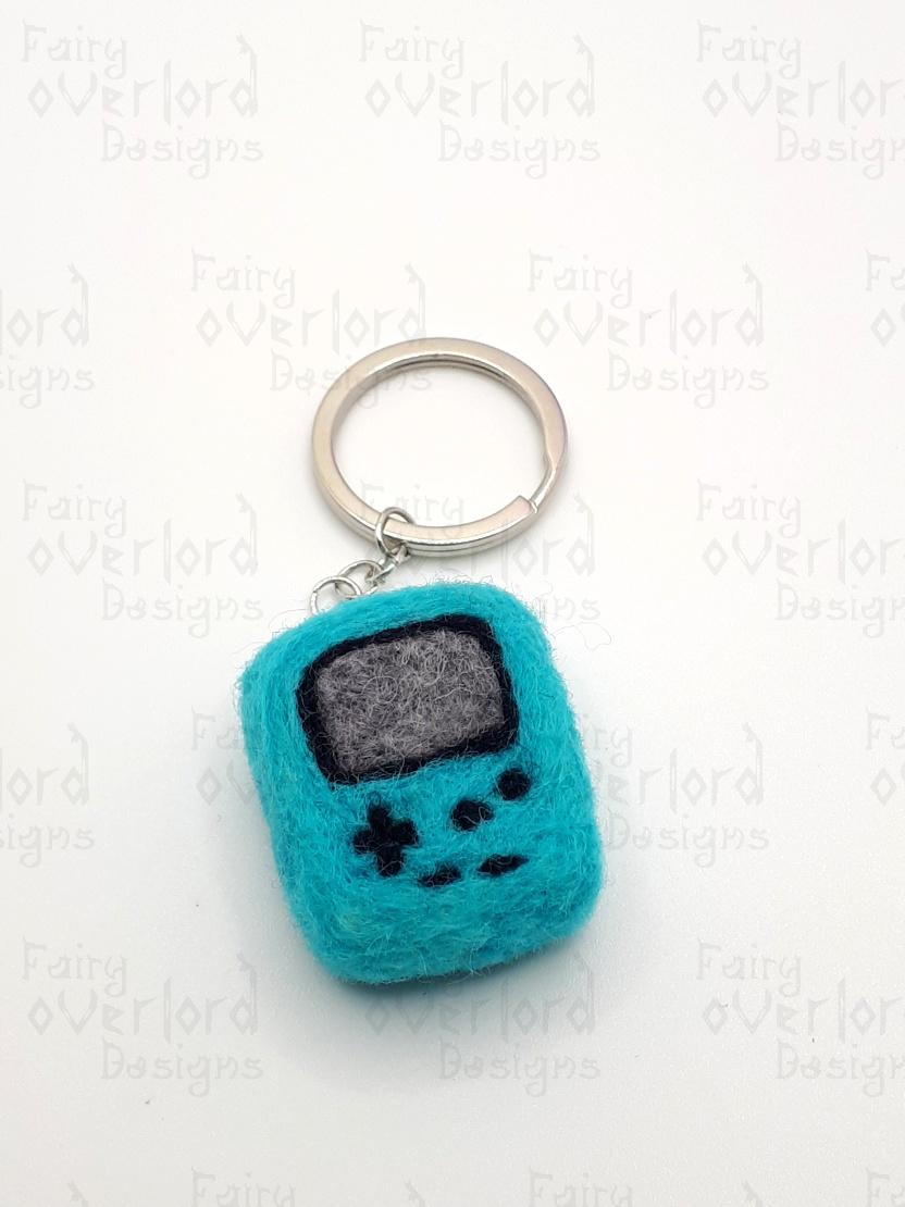 Light Blue Gameboy keychain – Fairy Overlord Designs