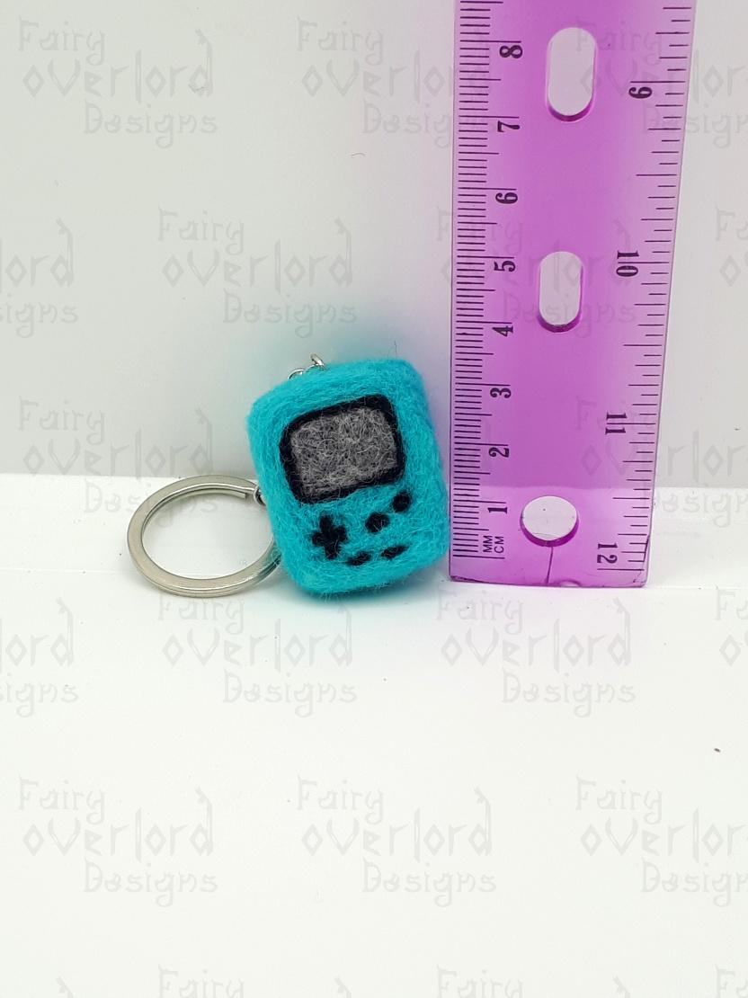 Light Blue Gameboy keychain – Fairy Overlord Designs